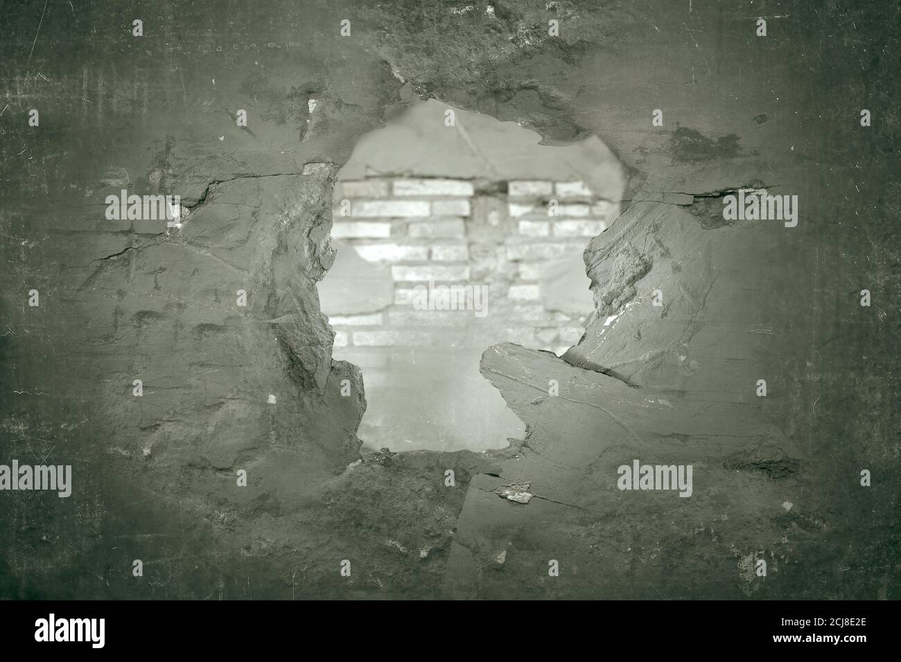 Hole in the grunge wall for hiding with brick wall background Stock ...