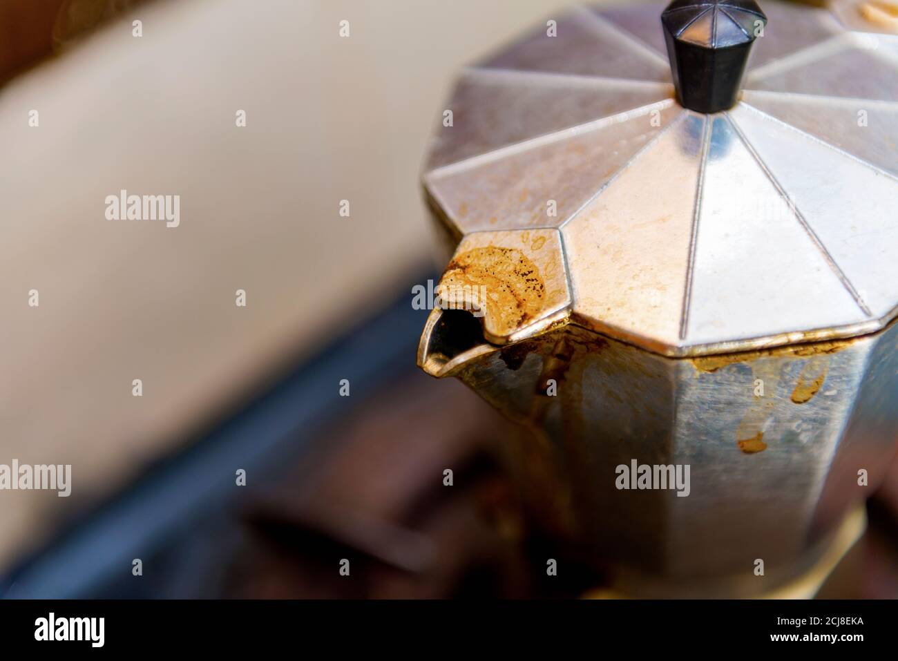 Brewing coffee using an old coffee maker on the stove Stock Photo - Alamy