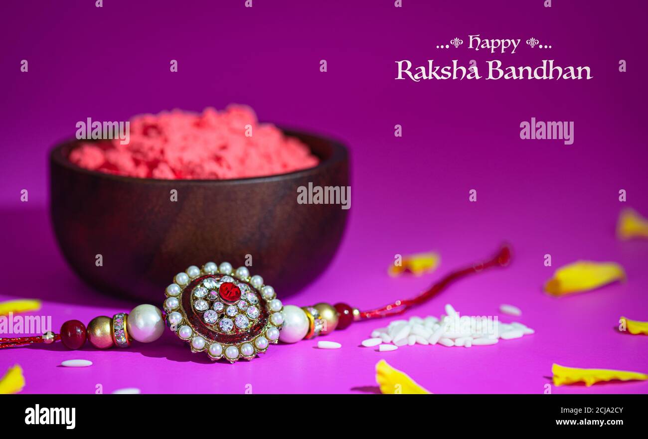 Raksha Bandhan, Indian festival with beautiful Rakhi and Rice Grains on ...