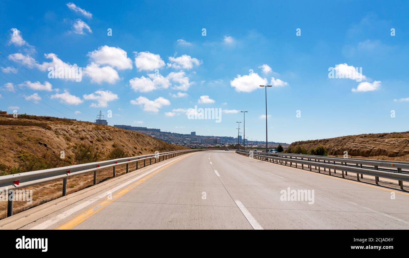 Empty wide highway outside the city Stock Photo - Alamy