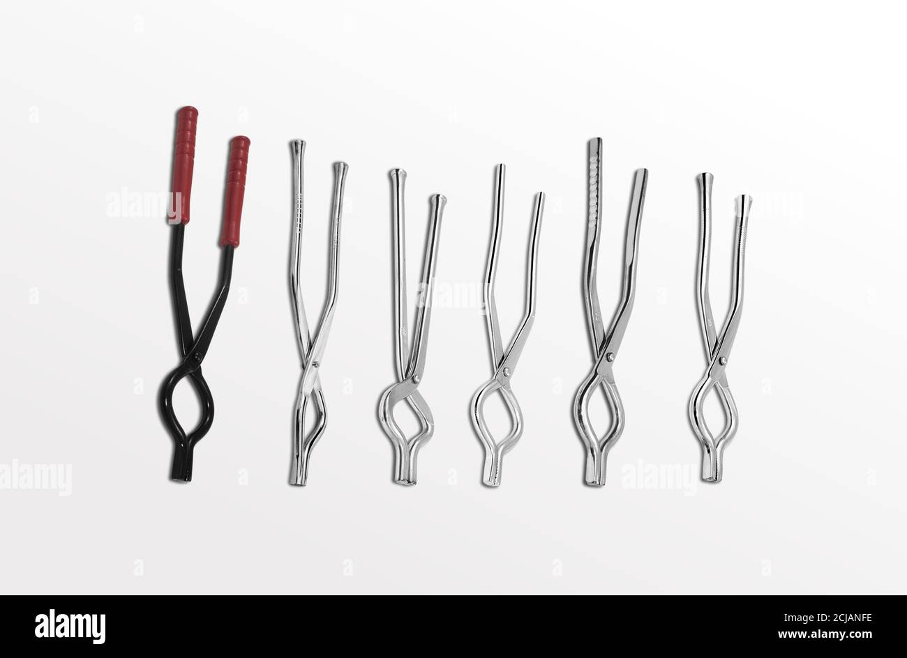 kitchen pincer, A stainless steel kitchen pincer placed upright against ...