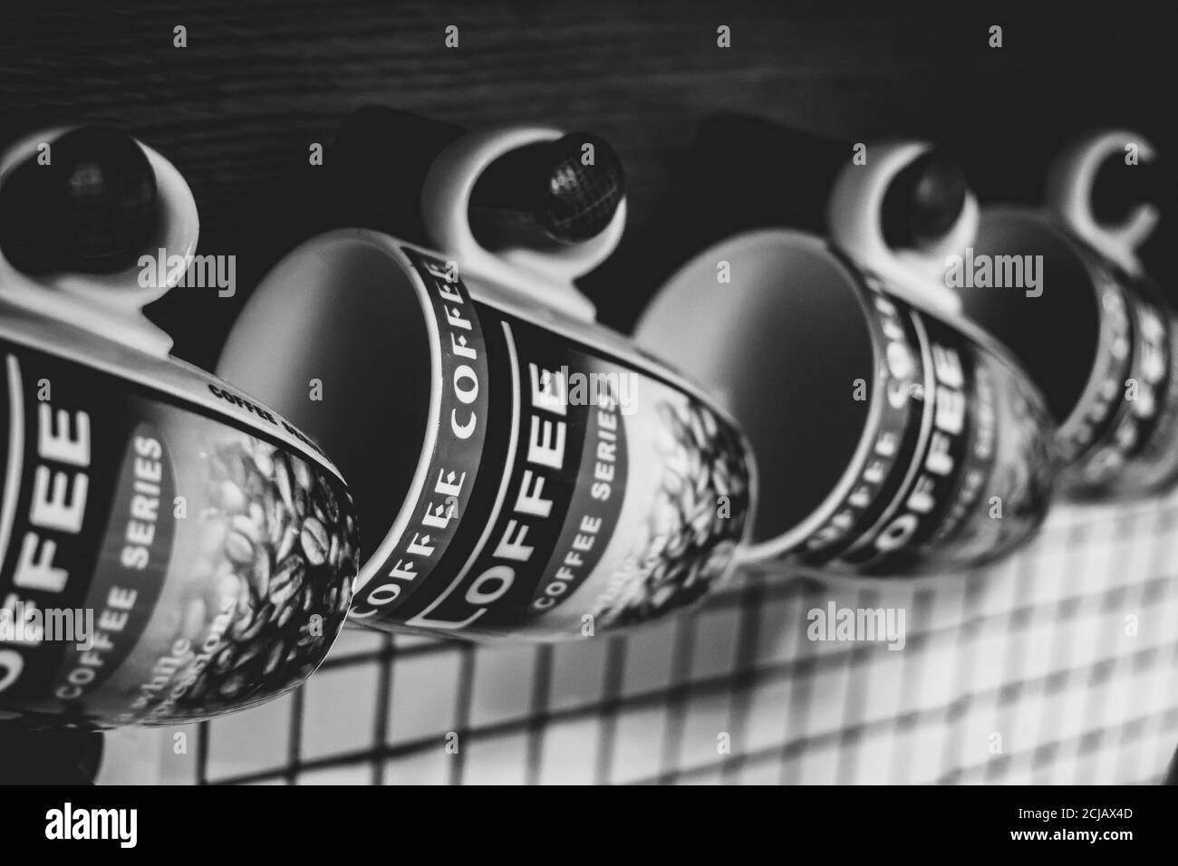 Grayscale shot of coffee cup set Stock Photo - Alamy