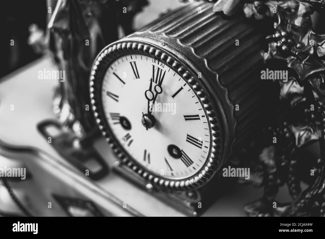 Grayscale shot of a vintage clock Stock Photo - Alamy