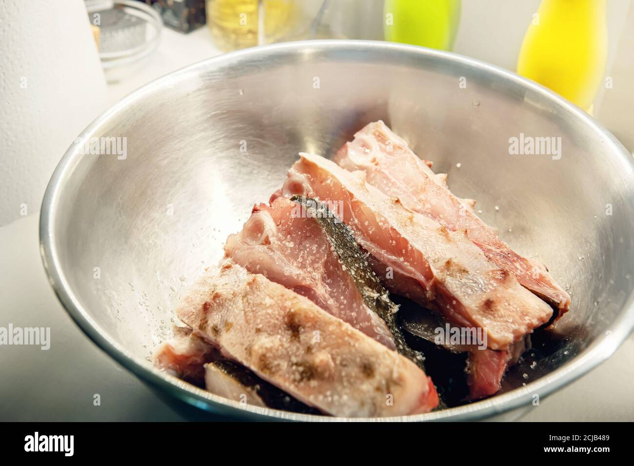 Black sea flounder Kalkan cut into pieces. Delicious fish is marinated ...