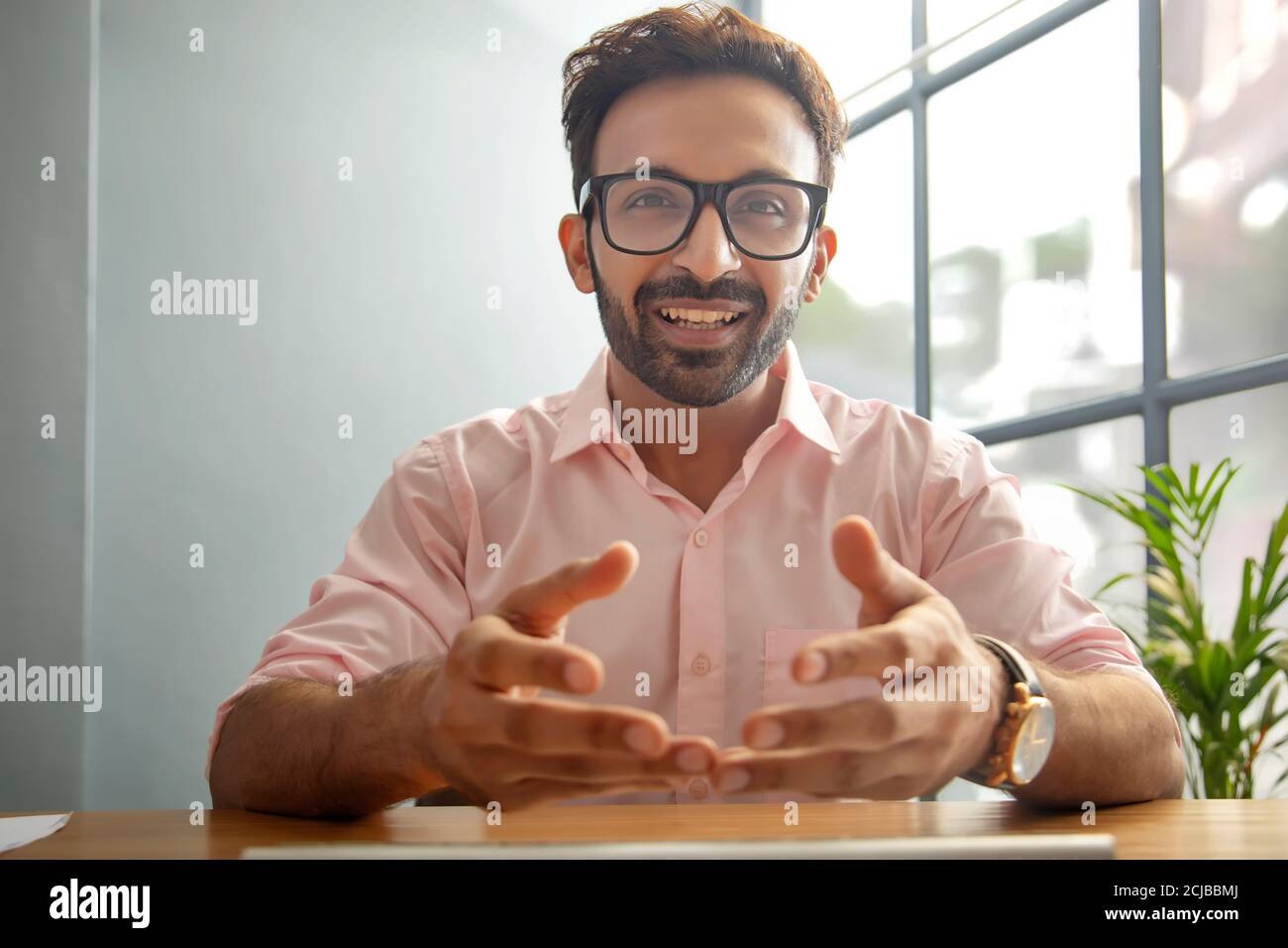 Indian man businessman video call hi-res stock photography and images ...