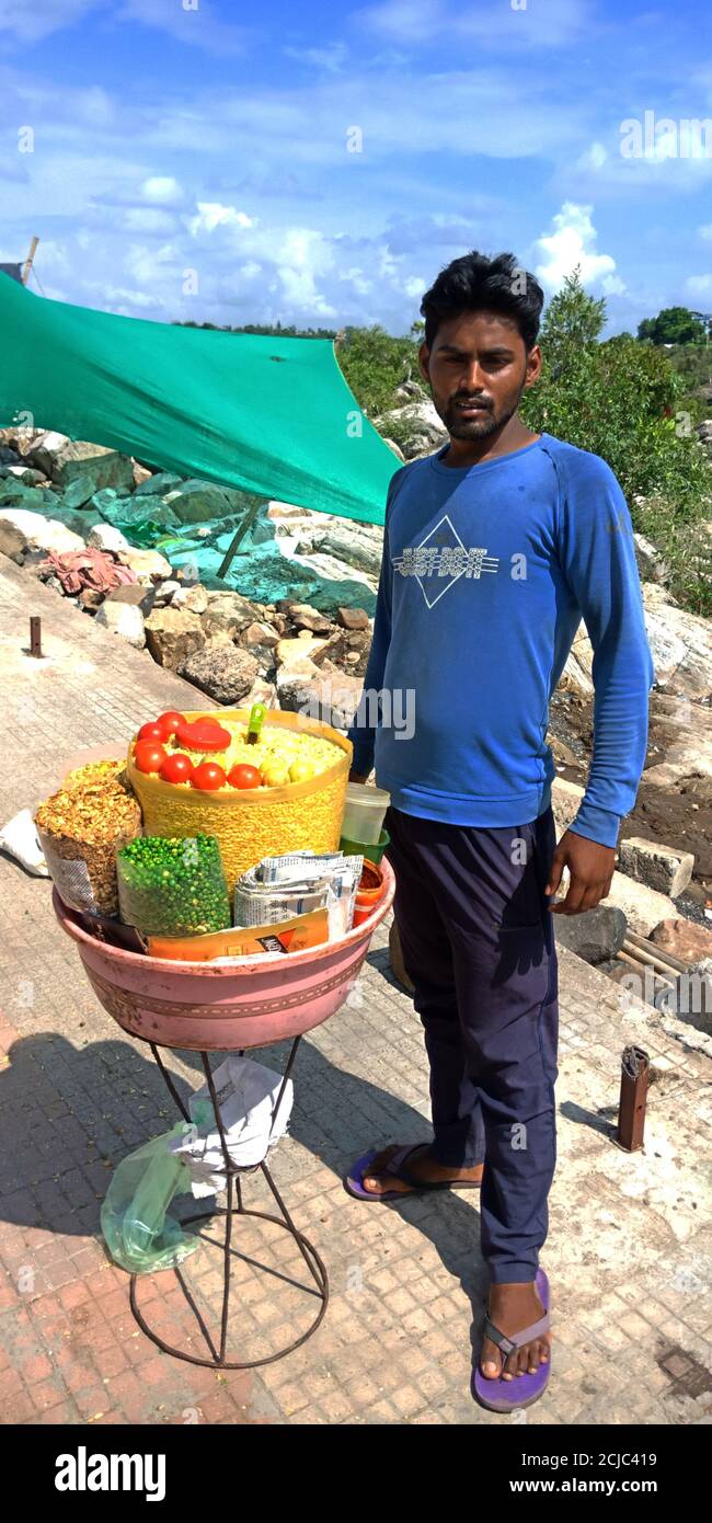 Indian Boy Selling At Market High Resolution Stock Photography and ...