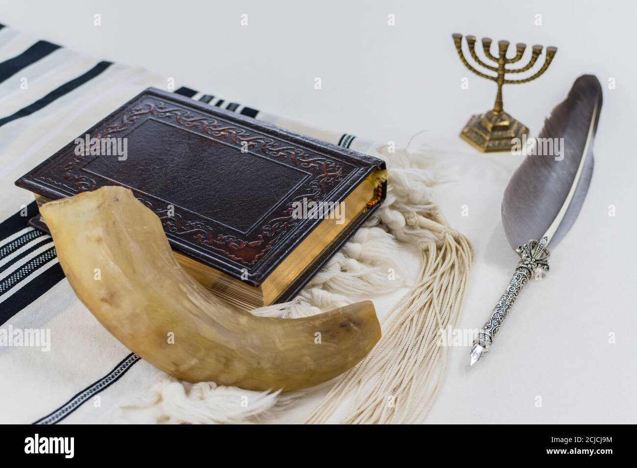 Shot of symbols of the Jewish holiday on white background Stock Photo ...