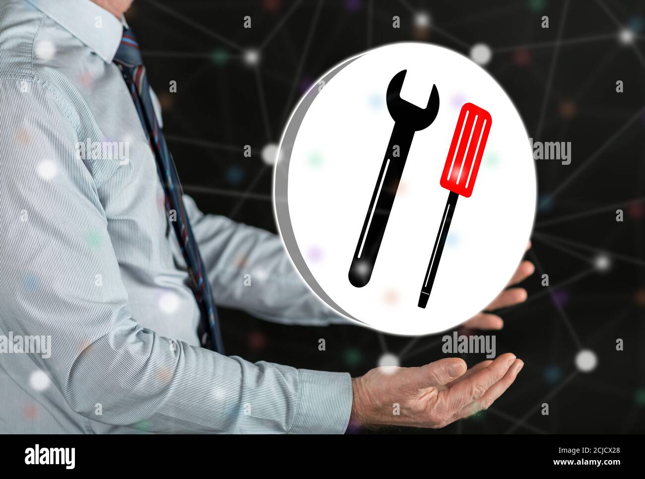 Maintenance service concept above the hands of a man Stock Photo - Alamy