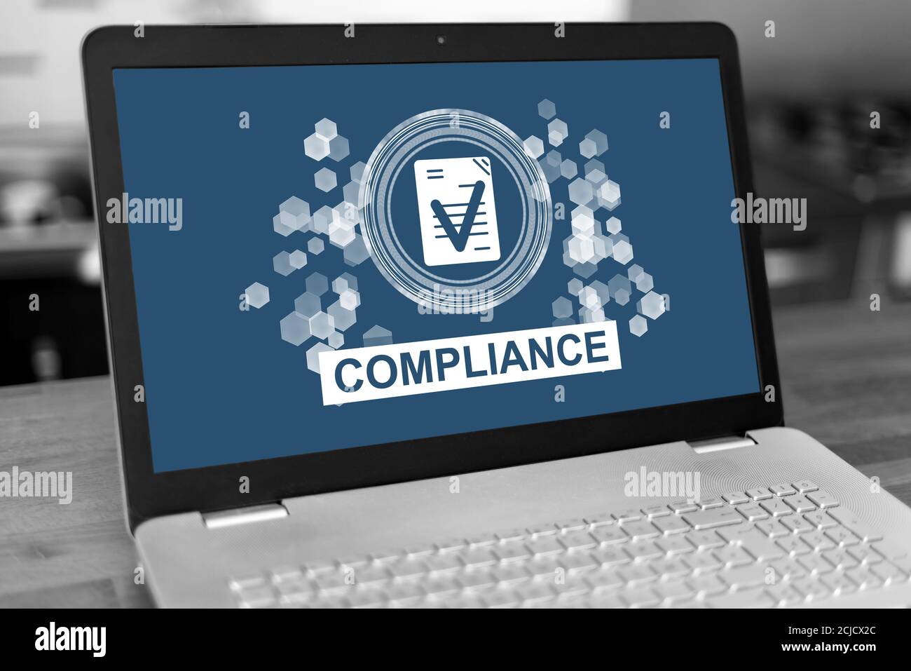Laptop screen with compliance concept Stock Photo - Alamy