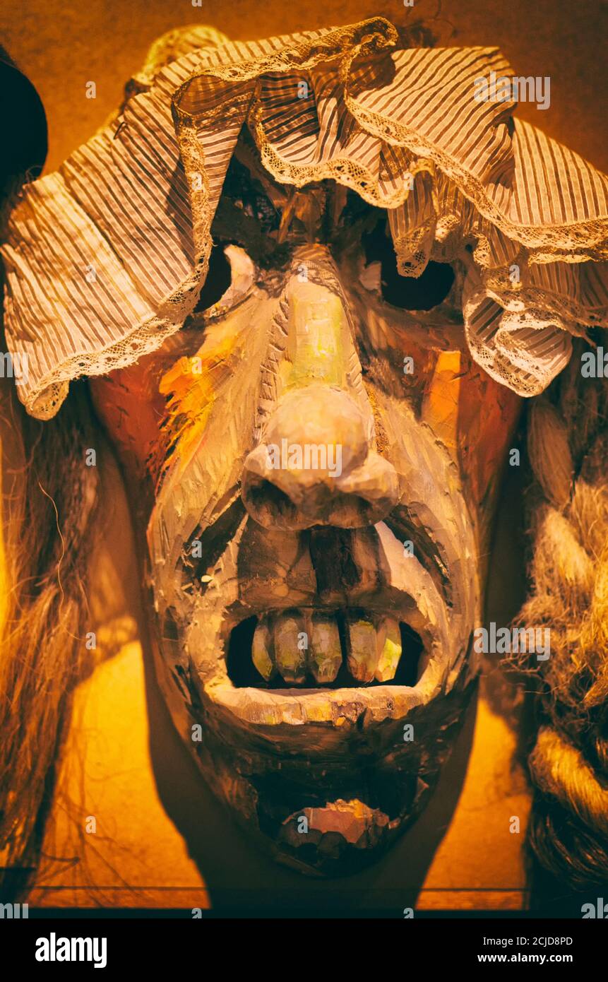 Frightening women's mask for the traditional harvest festival in the ...