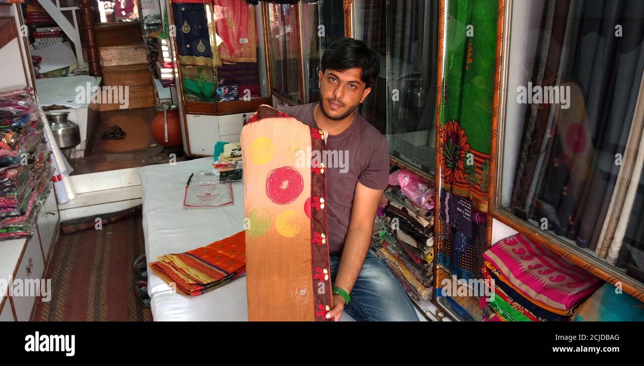 DISTRICT KATNI, INDIA - SEPTEMBER 22, 2019: An indian shopkeeper ...