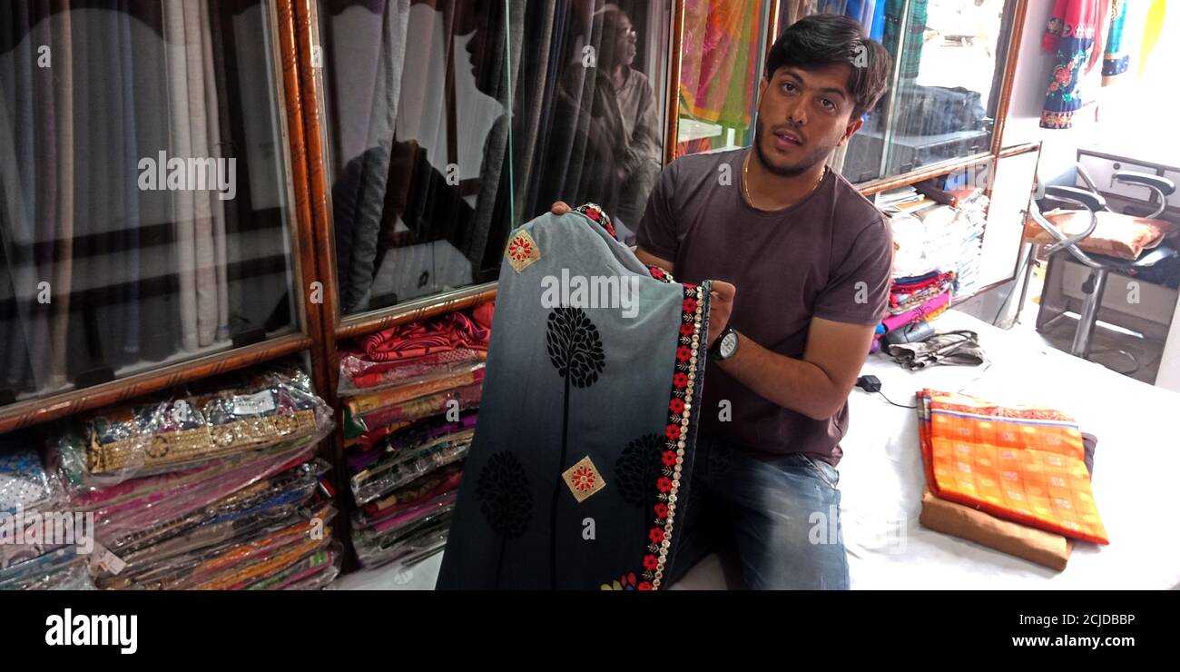 DISTRICT KATNI, INDIA - SEPTEMBER 22, 2019: An indian shopkeeper ...