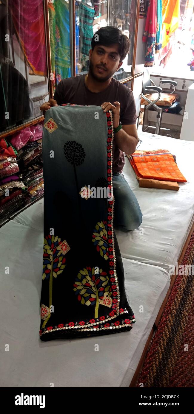 DISTRICT KATNI, INDIA - SEPTEMBER 22, 2019: An indian shopkeeper ...