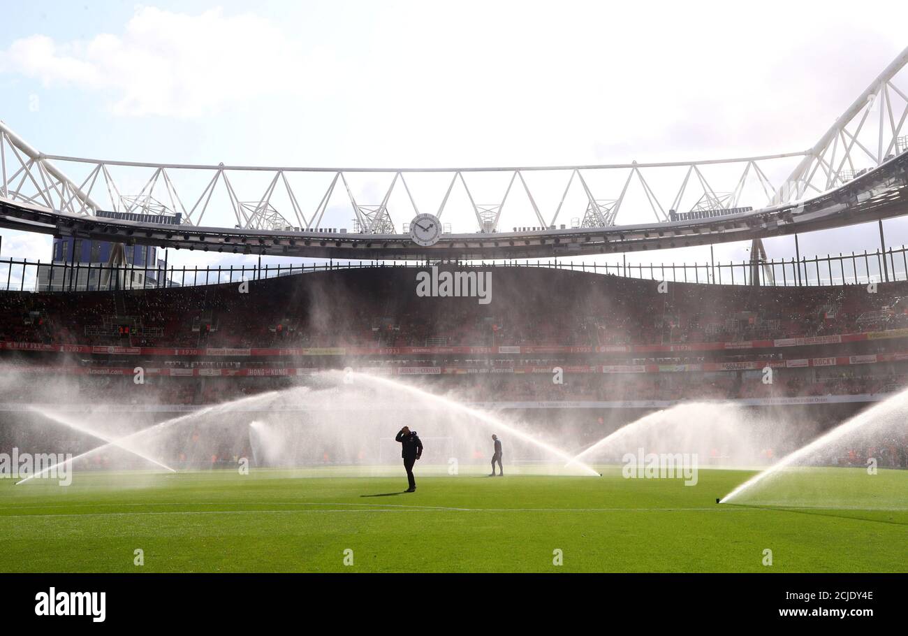 Sprinklers water pitch before match hi-res stock photography and images ...