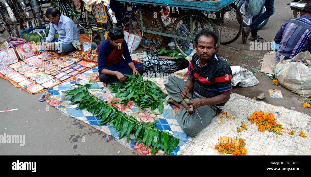 DISTRICT KATNI, INDIA - OCTOBER 19, 2019: Asian poor people selling ...
