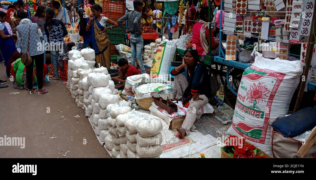 DISTRICT KATNI, INDIA - OCTOBER 19, 2019: Asian poor female vender ...