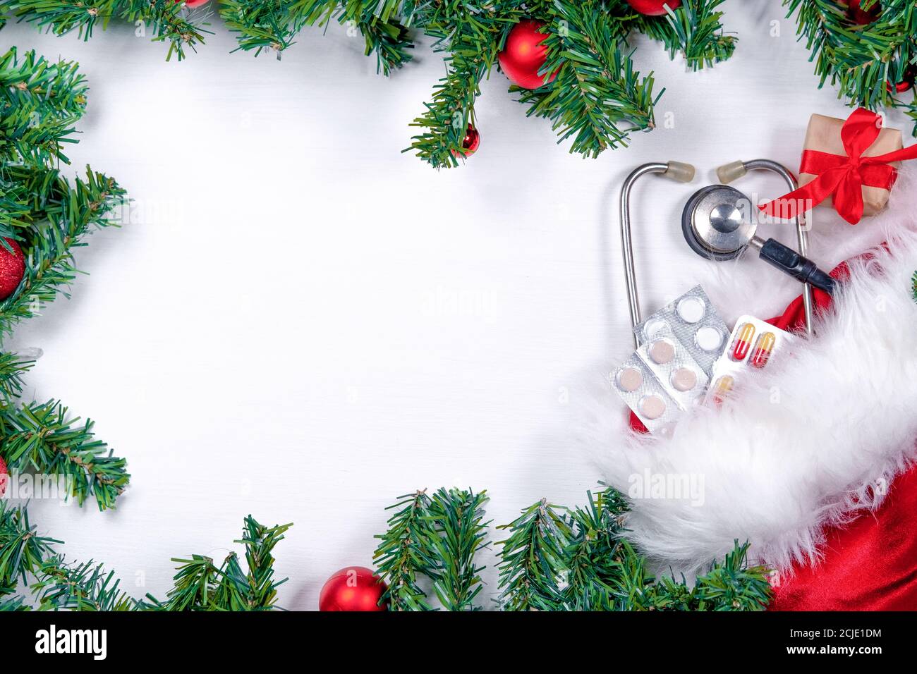 Medical banner with pills, gift present box, stethoscope and Christmas ...