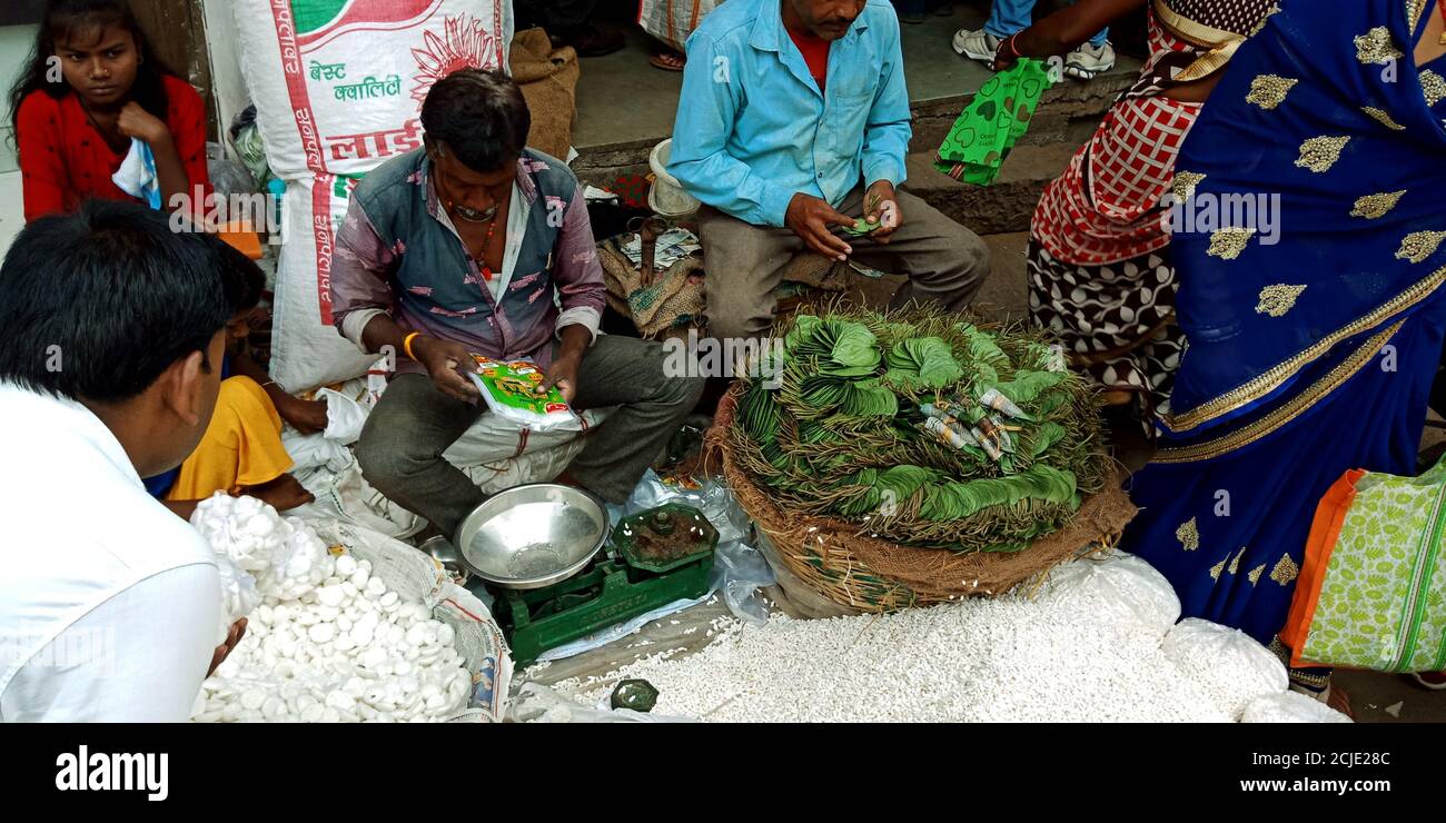 DISTRICT KATNI, INDIA - OCTOBER 19, 2019: Asian poor people selling ...
