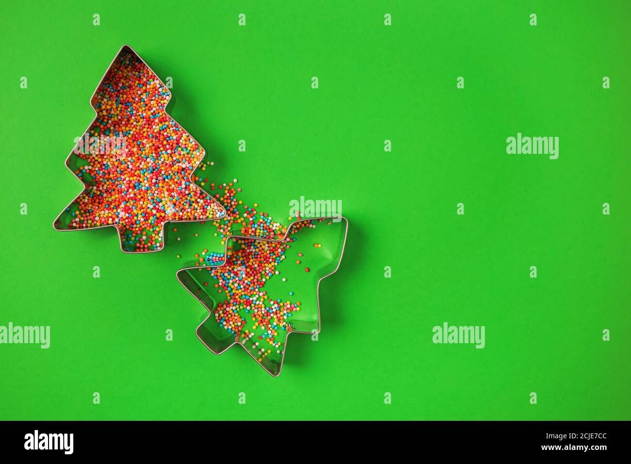 Christmas tree shape gingerbread cookie cutters and scattering ...