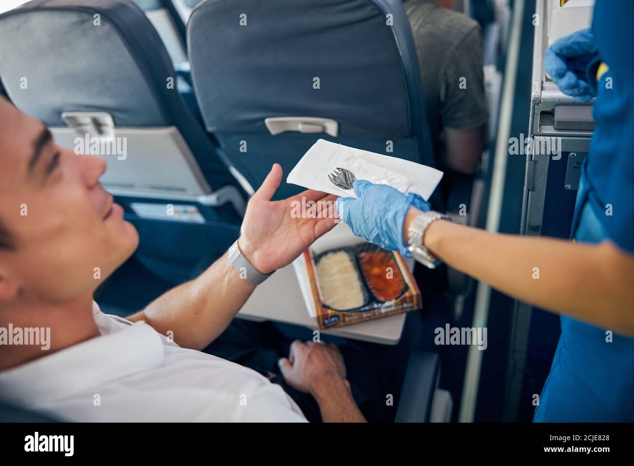 Air Stewardess Serving Food High Resolution Stock Photography and ...