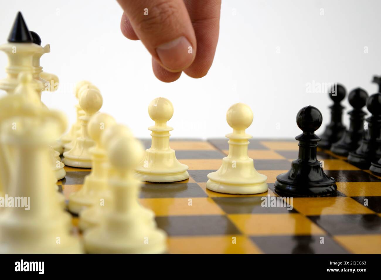 Hand moves chess pieces hi-res stock photography and images - Alamy