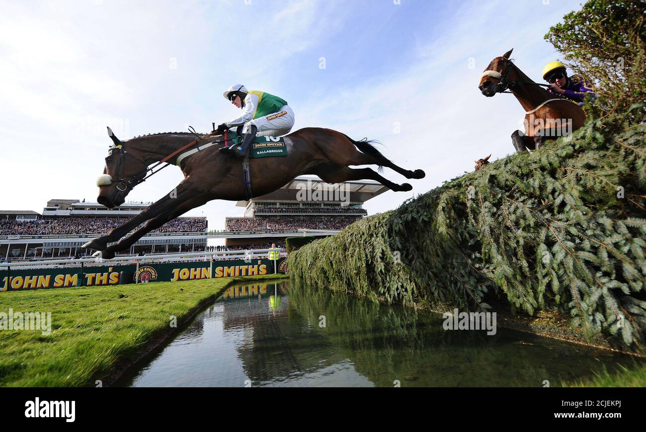 Ballabriggs jumps the water jump and wins the Grand National with ...