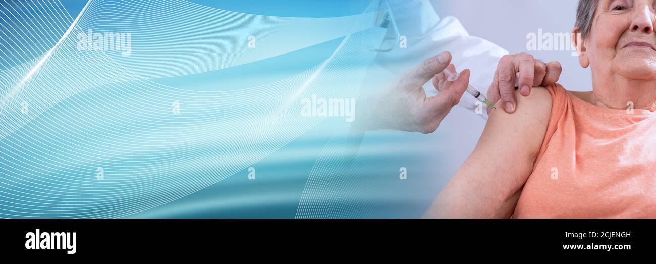 Doctor giving an injection to senior woman; panoramic banner Stock ...