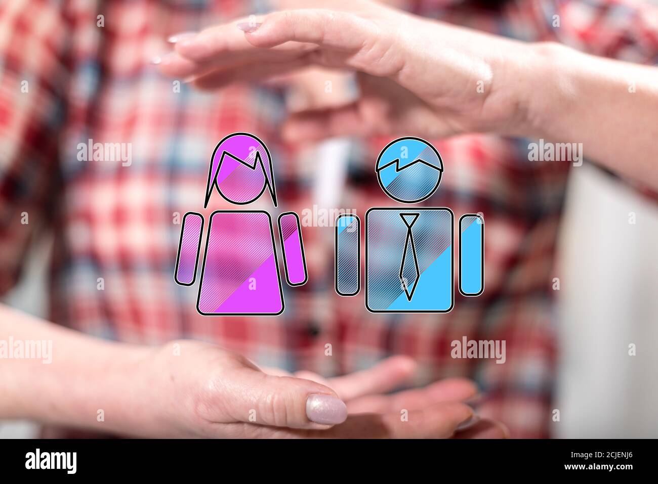 Gender equality concept between hands of a woman in background Stock ...