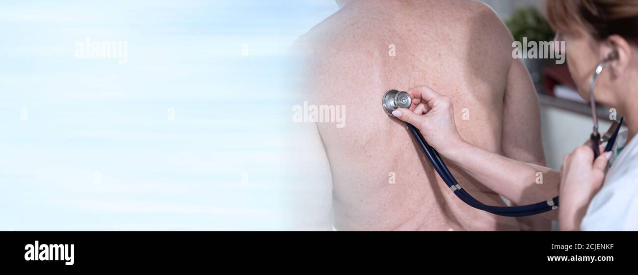 Female doctor auscultating her patient with stethoscope; panoramic ...