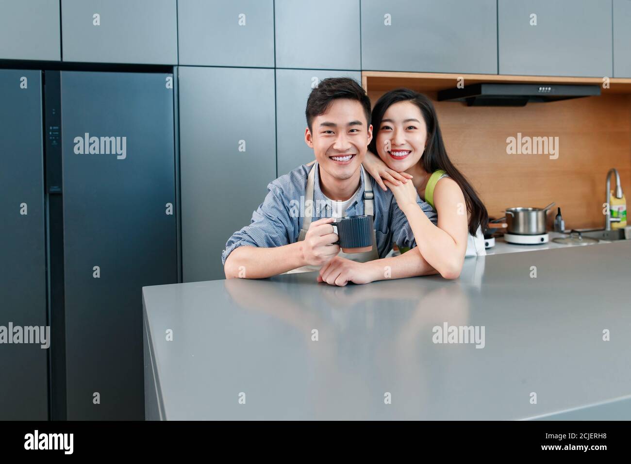Women sitting around kitchen table hi-res stock photography and images ...