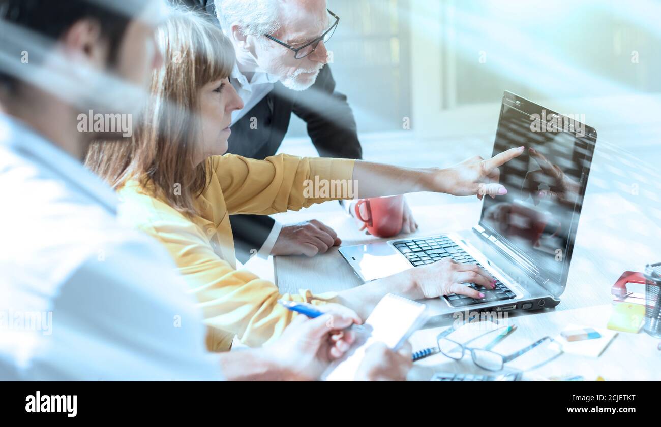 Business people working together in office, light effect; multiple ...