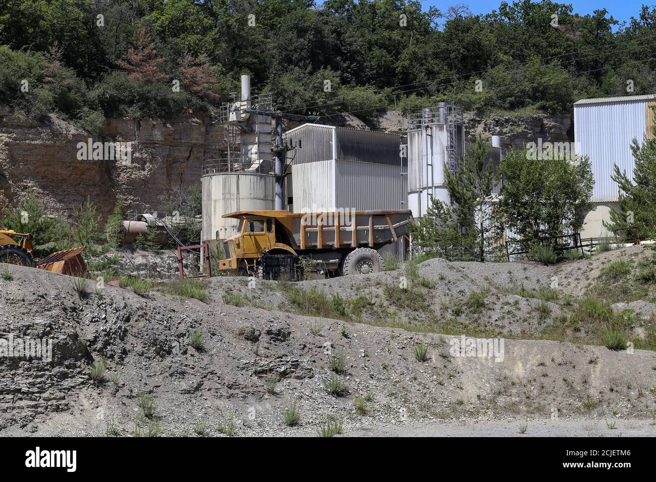Sunny scenery of a sand mining process in an industrial quarry Stock ...