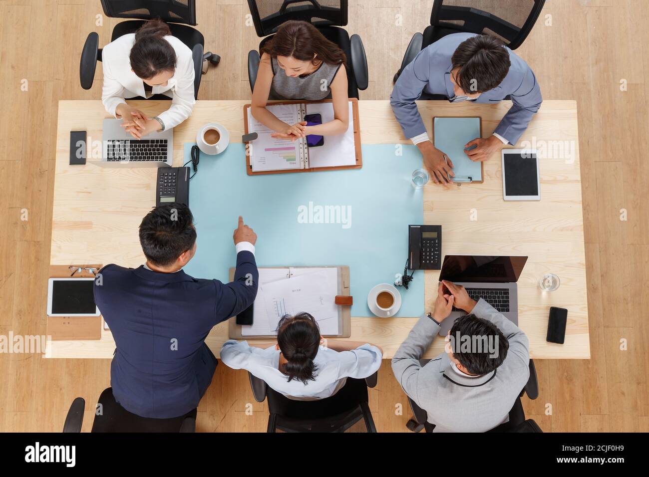 Business team meeting in indoor Stock Photo - Alamy