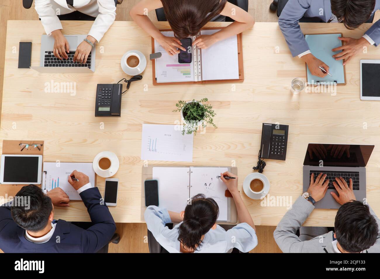 Business team meeting in indoor Stock Photo - Alamy