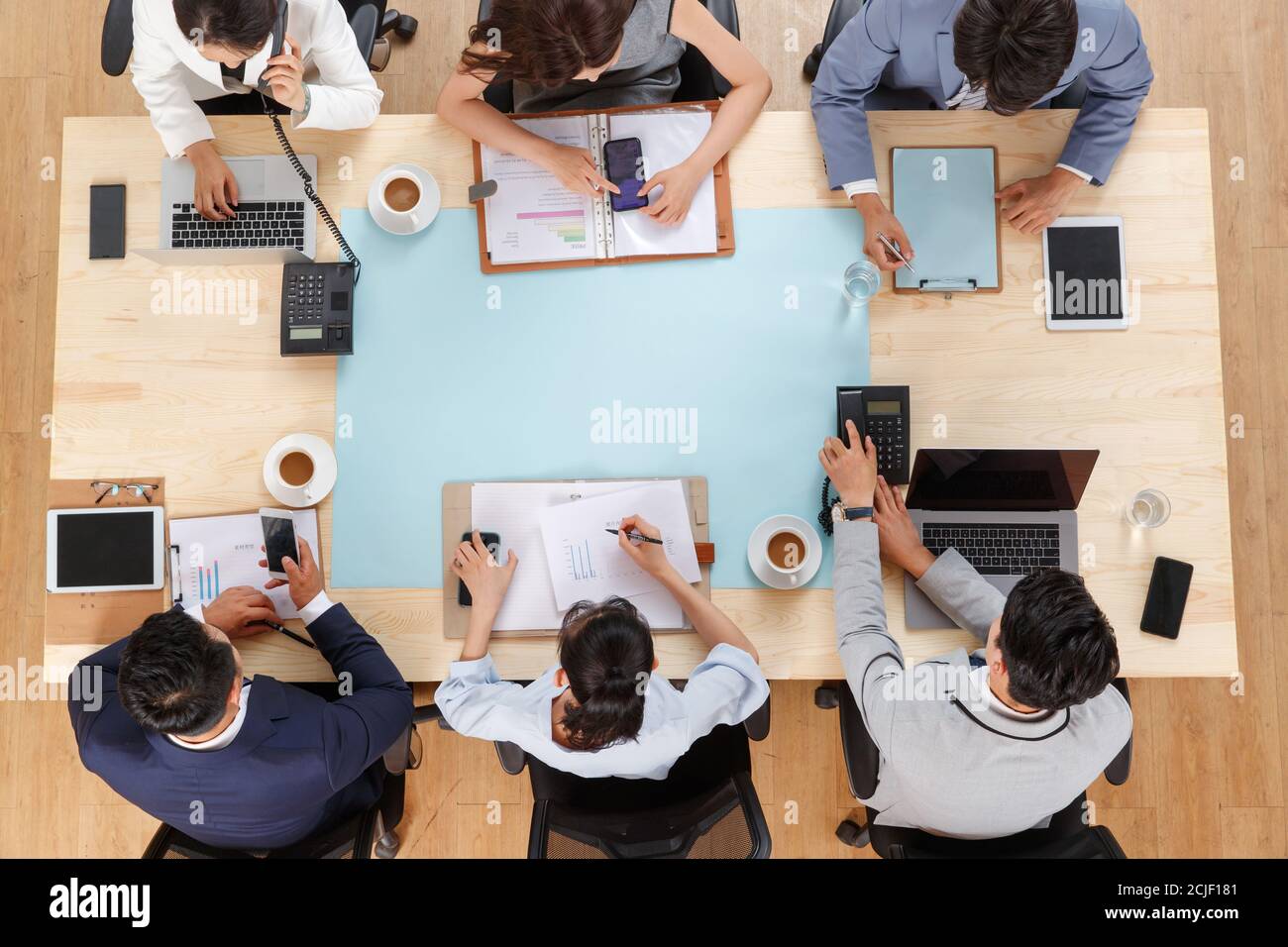 Business team meeting in indoor Stock Photo - Alamy