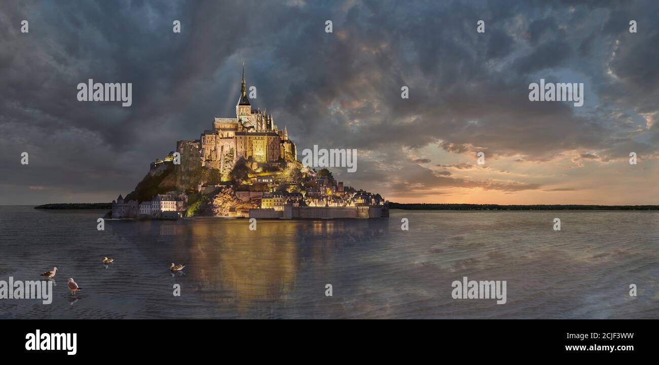 Scenic view of the tidal island of Mont Saint Michel at night at high ...