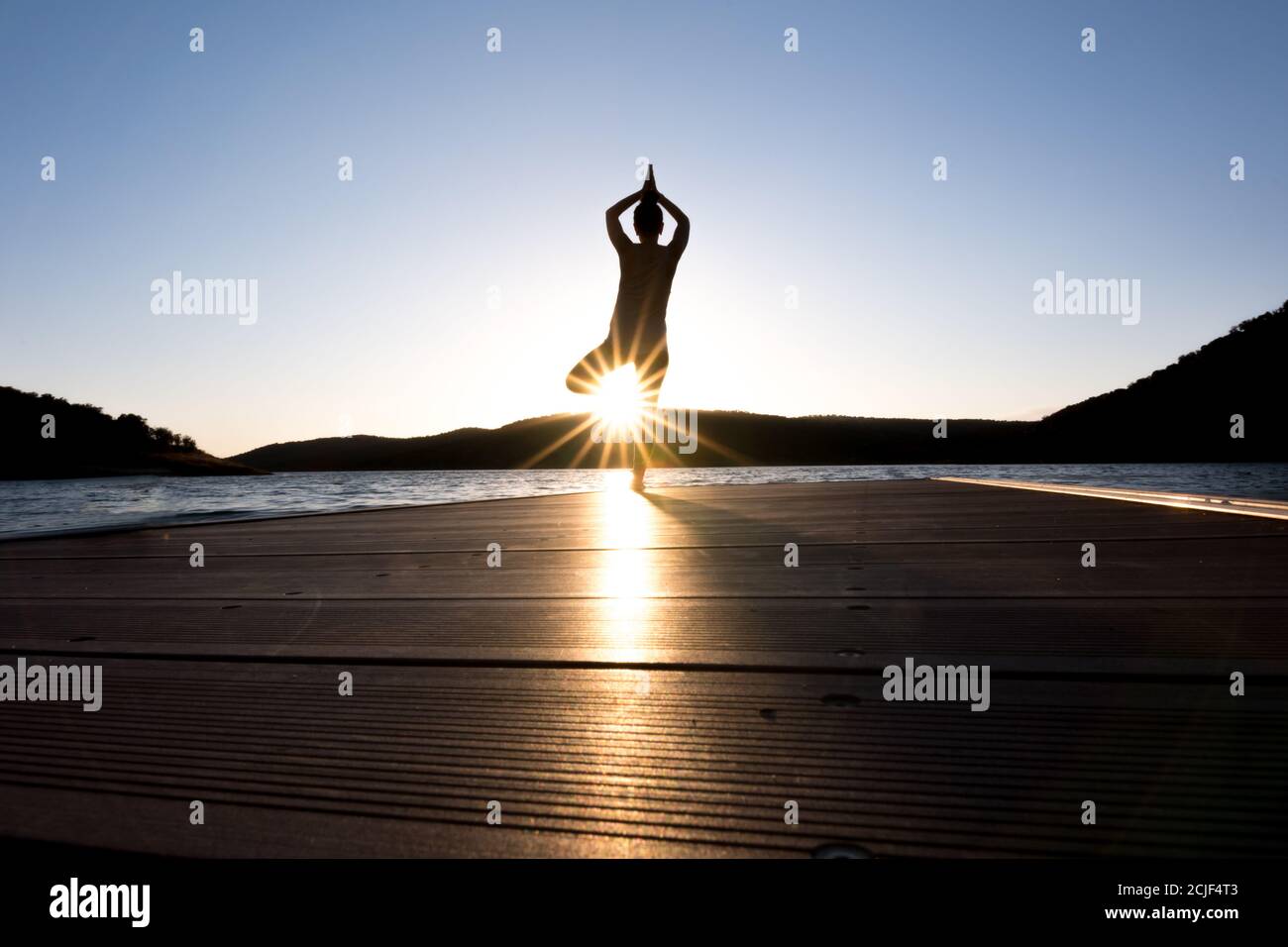 Yoga tree sunrise hi-res stock photography and images - Alamy