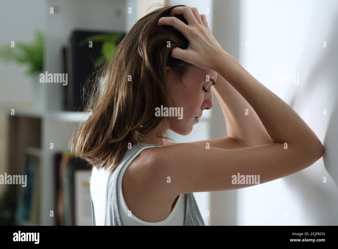 Side view sad girl standing hi-res stock photography and images - Alamy
