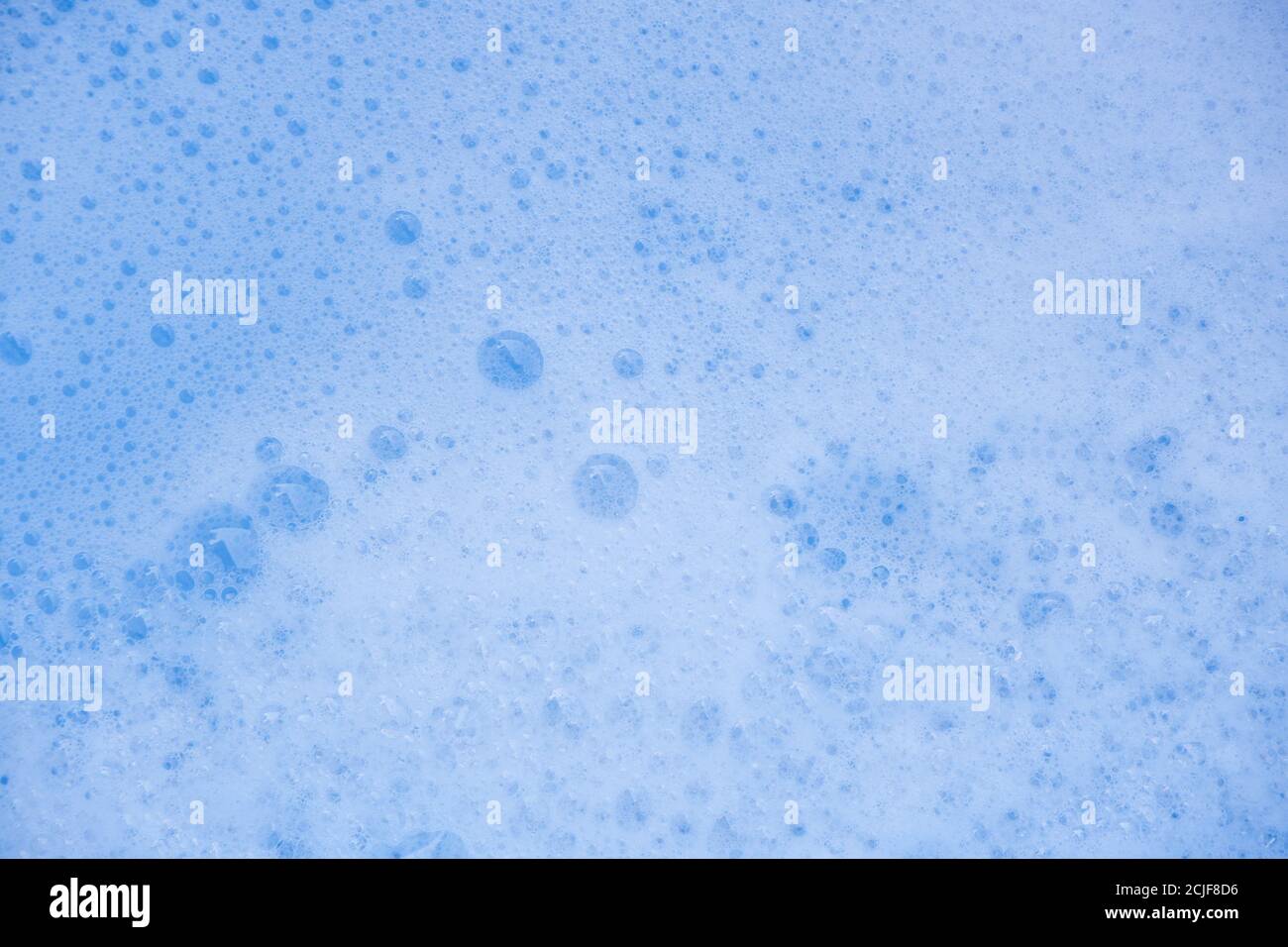 Abstract background white soapy foam texture. Shampoo foam with bubbles ...