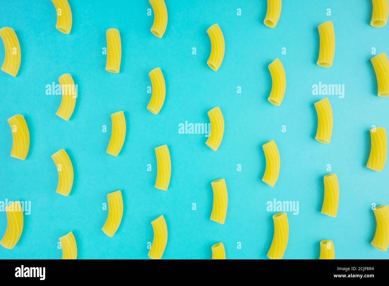 Macaroni pattern on blue background. Italian food. Pasta composition ...