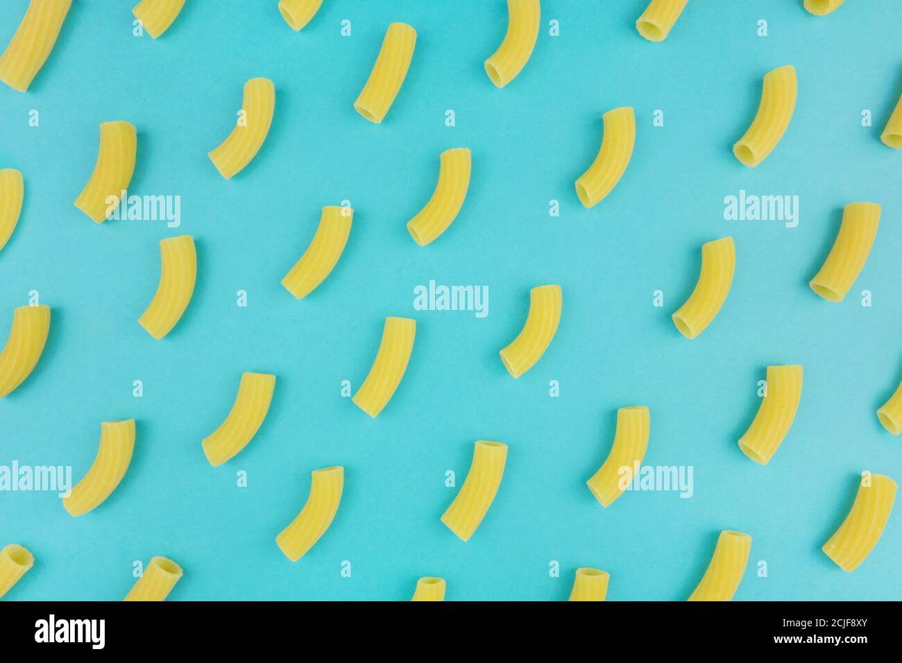 Macaroni pattern on blue background. Italian food. Pasta composition ...