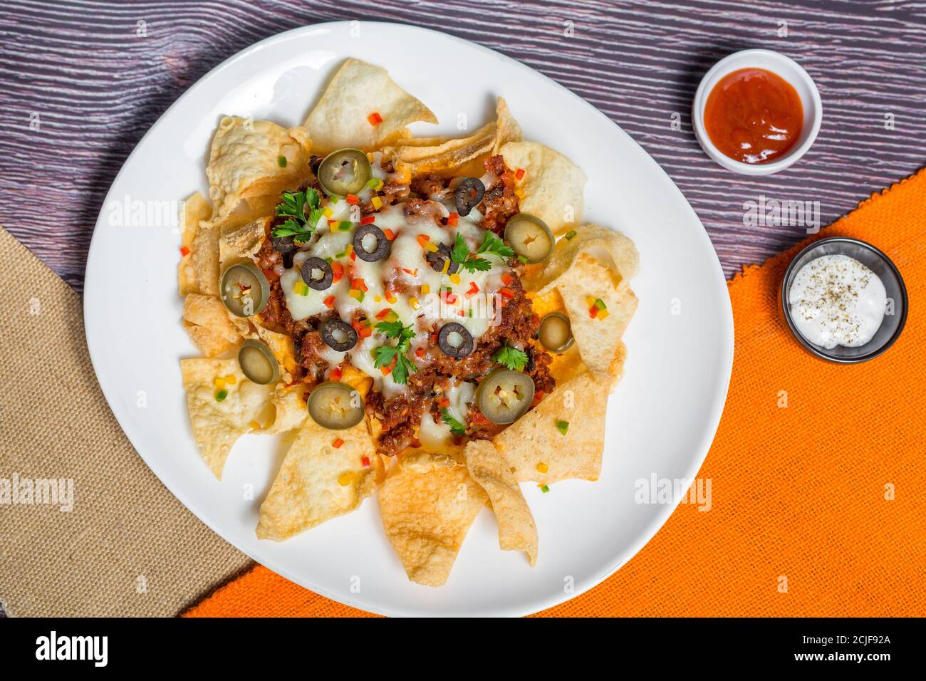 Mexican Famous Food Spicy Ground Beef Nachos. Heated crunchy tortilla ...