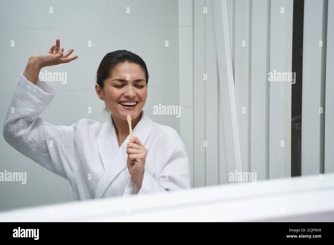 Female having fun during the oral hygiene procedure Stock Photo - Alamy