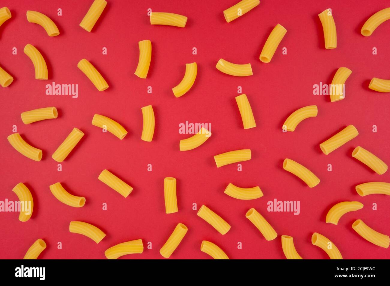 Macaroni pattern on red background. Italian food. Pasta composition ...