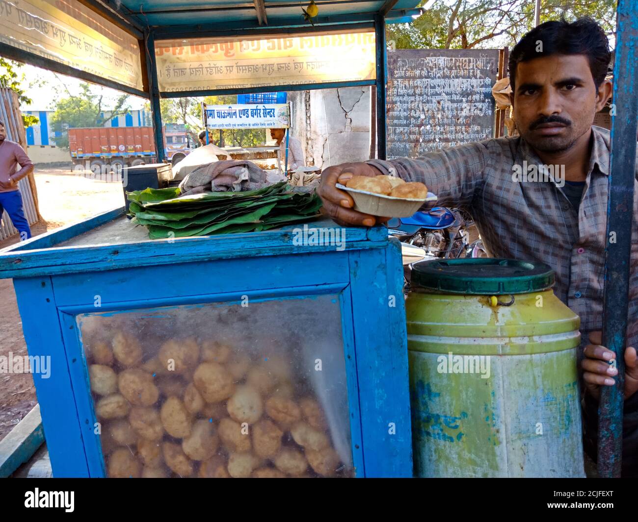 DISTRICT KATNI, INDIA - FEBRUARY 02, 2020: an indian man selling ...