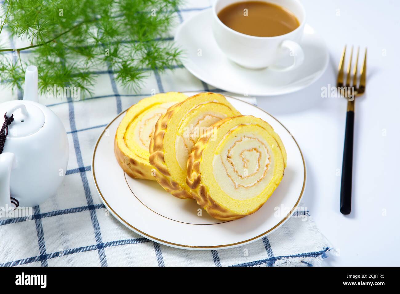 The Swiss roll cake delicious afternoon tea Stock Photo - Alamy