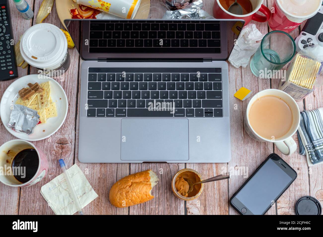 Working from home concept. View from above to workplace with a laptop ...