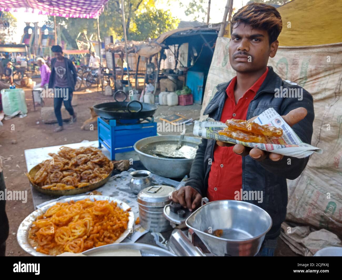 DISTRICT KATNI, INDIA - FEBRUARY 02, 2020: an indian poor boy offering ...