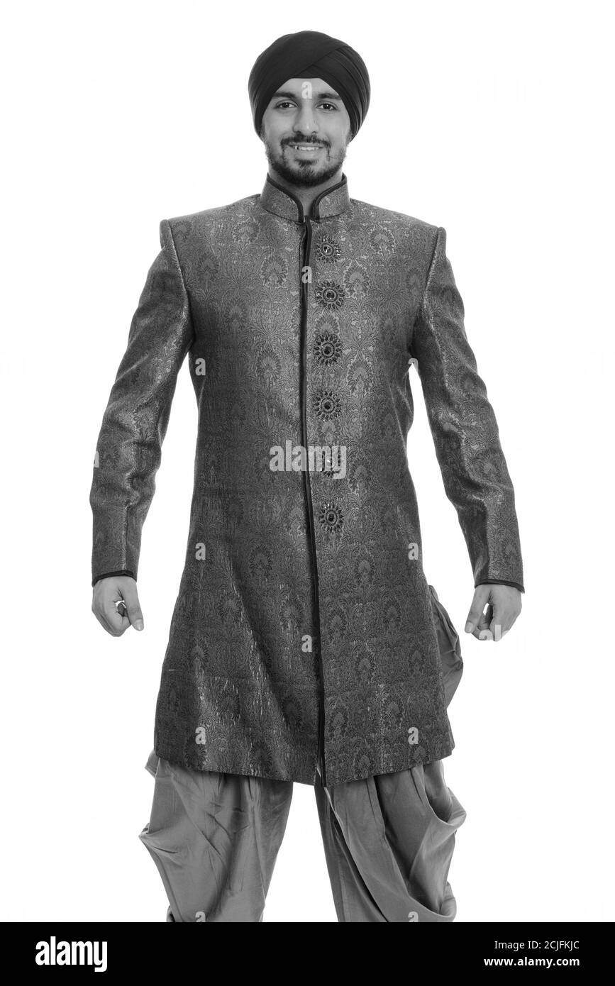 Young happy Indian Sikh man smiling wearing traditional clothes Stock ...