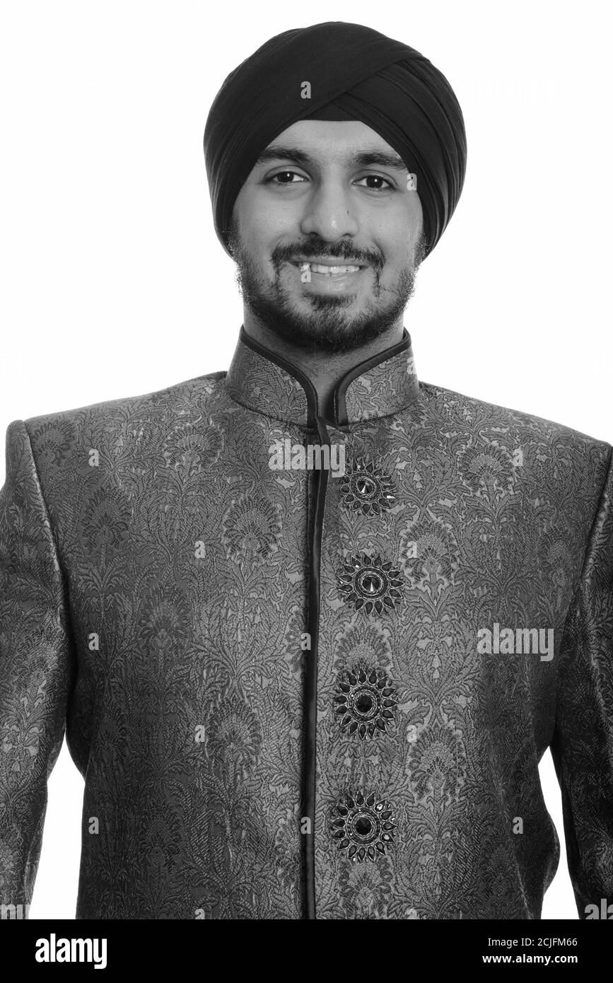 Young happy Indian Sikh man smiling wearing traditional clothes Stock ...